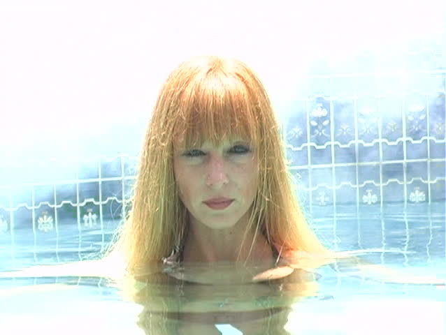 Sexy Redhead In The Pool With Lingerie 2 Stock Footage Video 698479