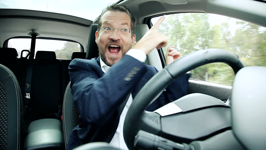 Happy Hip Business Man Dancing And Singing Celebrating While Driving