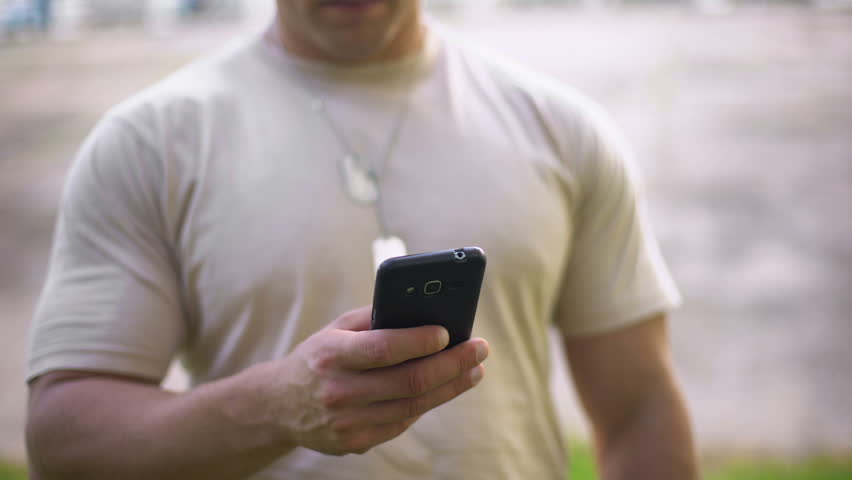 Military Officer Typing On Smartphone, Stock Footage Video (100% ...