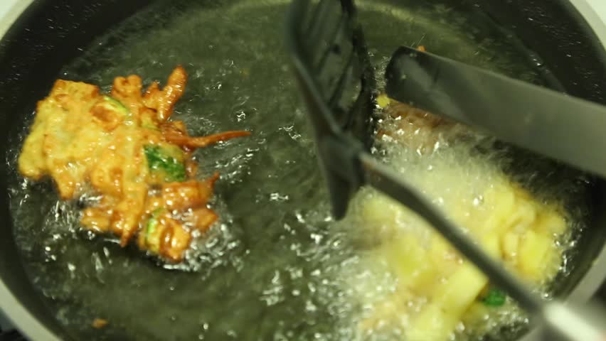 Putting and Stirring Food in Stock Footage Video (100% Royalty-free ...