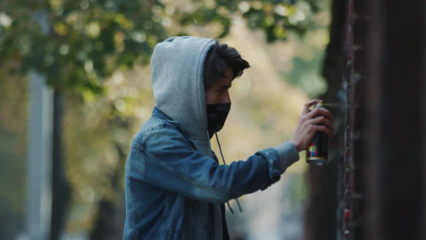 spray-paint-artist-working-on-a-painting image - Free stock photo ...