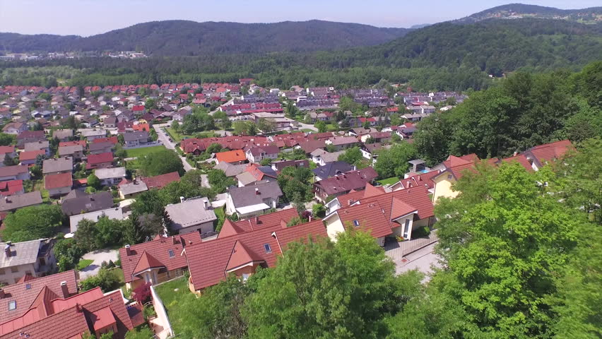 AERIAL: Flying Above Lush Treetops Towards Luxury Suburban Town ...
