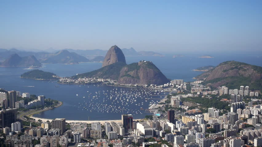 Airplane Flying In Front Of Sugarloaf Mountain In Rio De Janeiro ...