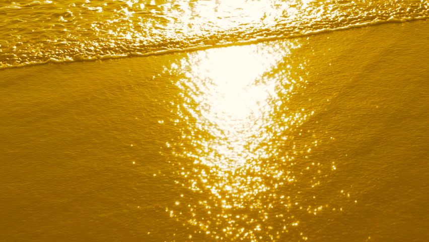 Stock Video Clip of Slow motion sparkling ocean in gold with | Shutterstock