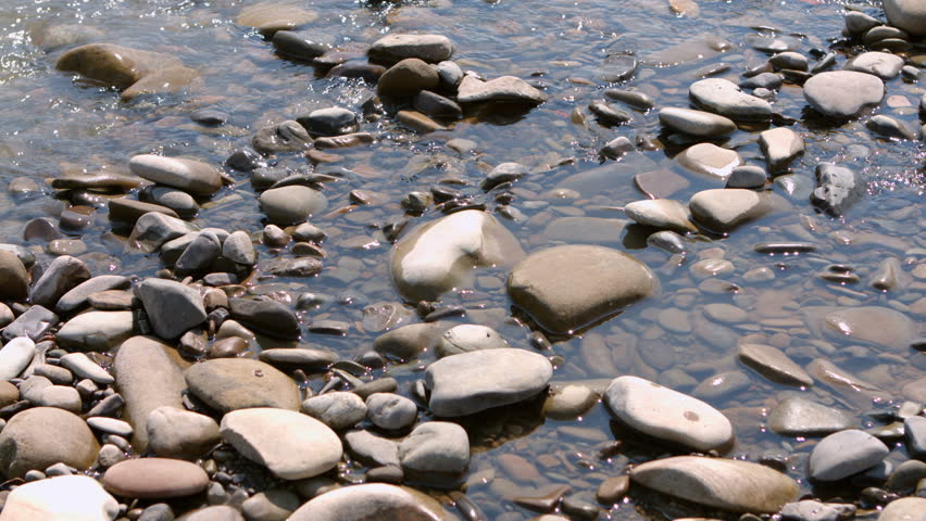 Sea Pebbles in Water. Ripples Stock Footage Video (100% Royalty-free ...
