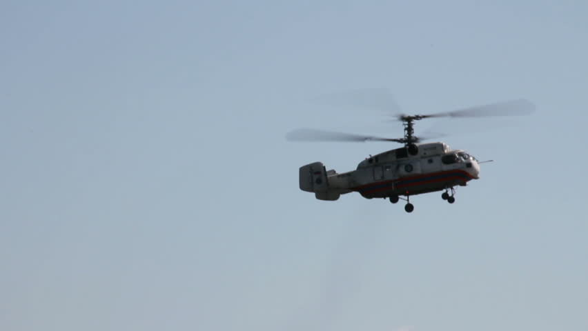 A Chinook CH-47 Helicopter Fly By With An Apache AH-64 In The ...