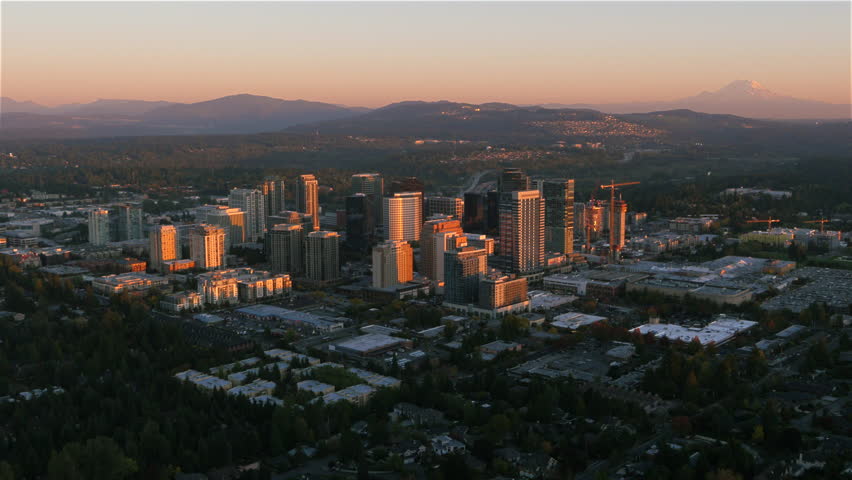 City Of Bellevue, Washington Aerial View At Dusk With MT Rainier In ...