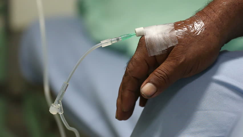 Closeup Saline Drip Into Patient Hand On Bed In Hospital Stock Footage ...
