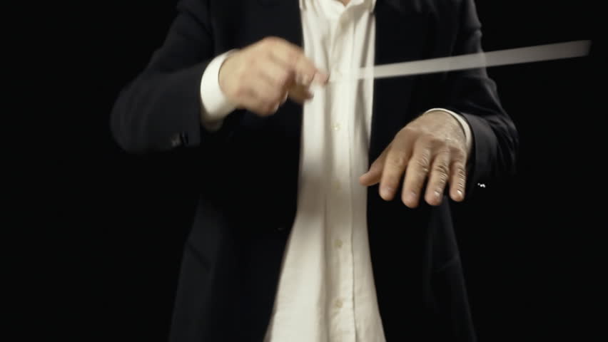 The Hands Of An Orchestra Conductor Directing The Musicians. Close-up ...