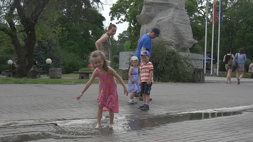 Kids Approaching Camera Running Away From School And Throwing Their ...