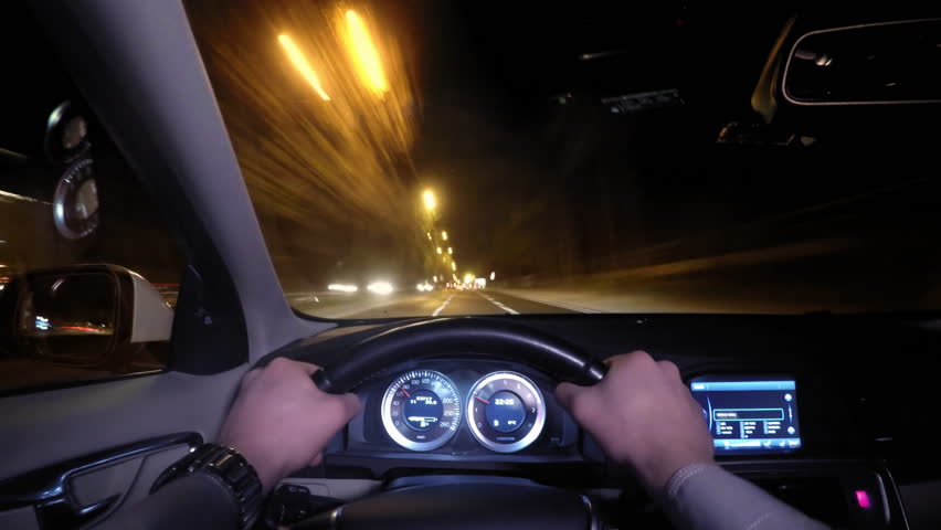 Point Of View Time Lapse: Car Driving Trough A Night City With Bright ...