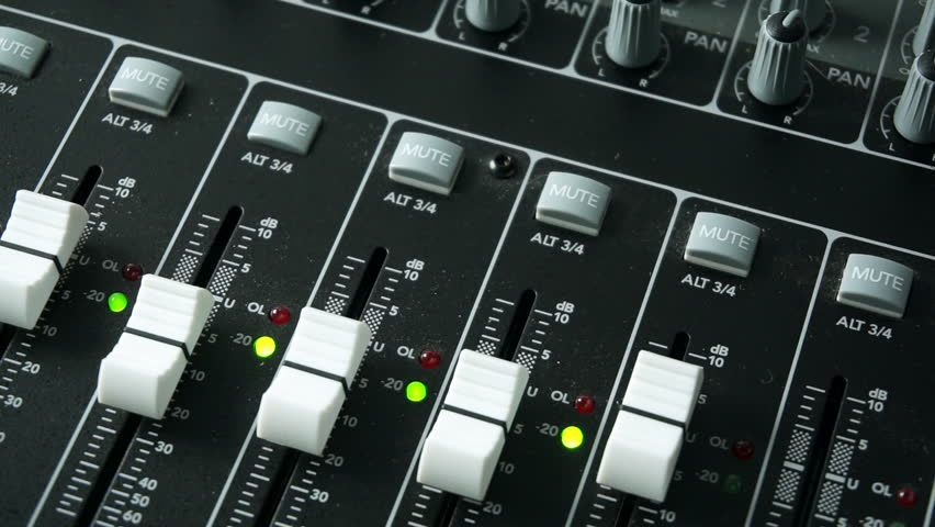 A Mixing Desk Or Mixing Console Being Used To Mix A Track In A ...