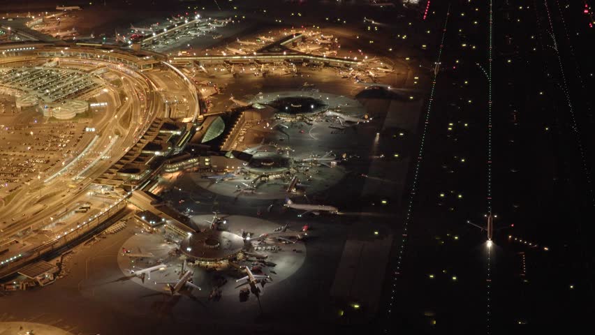 Helicopter Establishing Shot Of Airplanes Parking At International ...