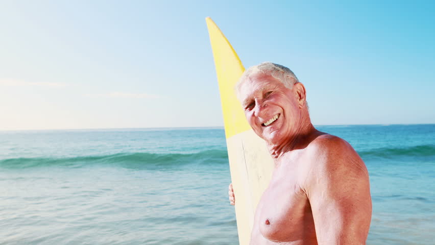 Retired Old Man Holding Surfboard Stock Footage Video (100% Royalty ...