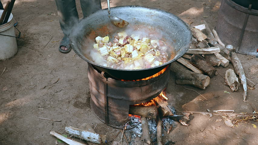 DUBAI, UAE - CIRCA 2013: CU View Of An Emirati Stirring A Pot Of Harees ...