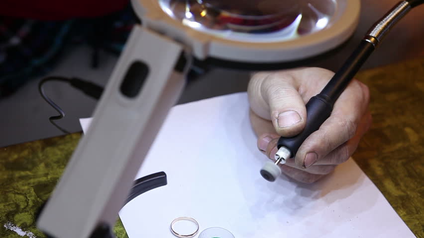 Jeweler Polishing Gold Ring with Stock Footage Video (100% Royalty-free ...