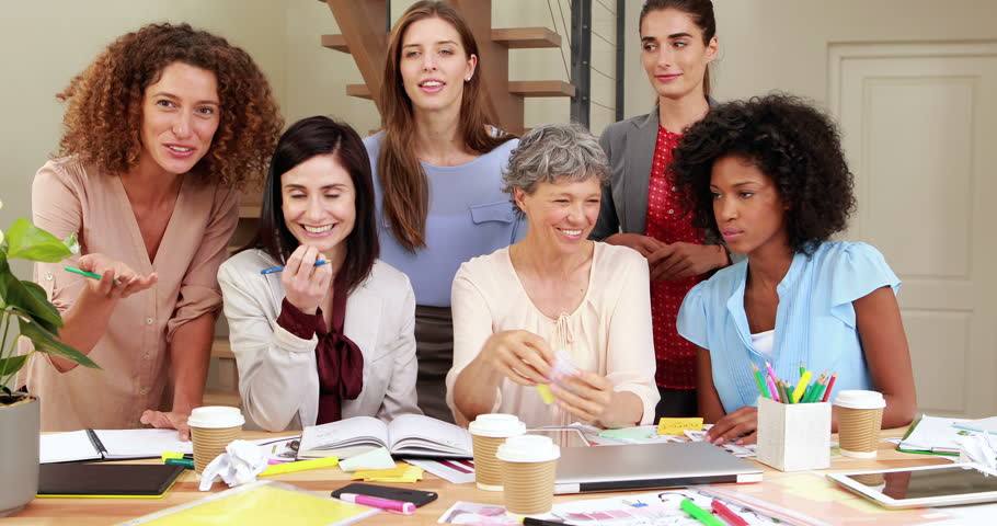 Smiling Women Working Together and Stock Footage Video (100% Royalty ...