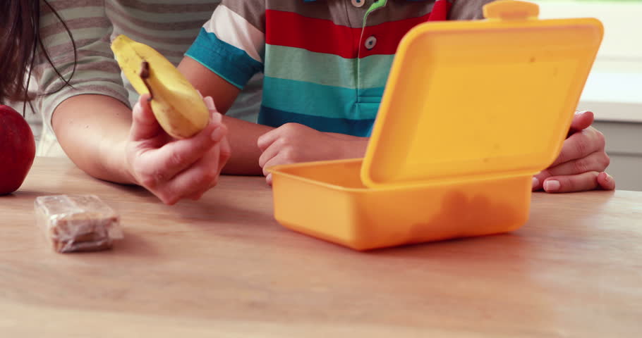 Mother Preparing Sons Lunch Box Stock Footage Video (100% Royalty-free ...