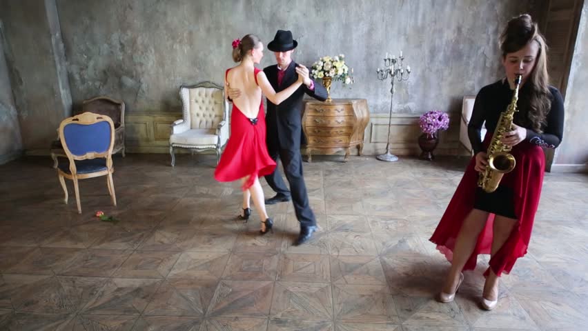 Couple Dancing Tango With Rose In Teeth In Retro Room Stock Footage ...