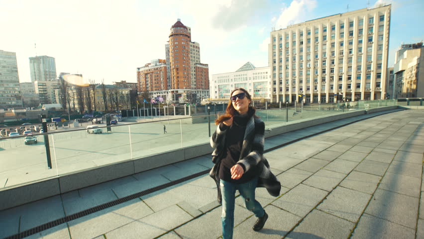Girl Walking Through the City Video de stock (totalmente libre de ...