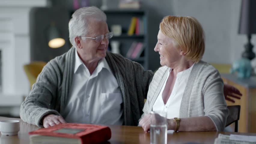Retired Active Senior People, Old Man Reading Paper With Elderly Wife ...