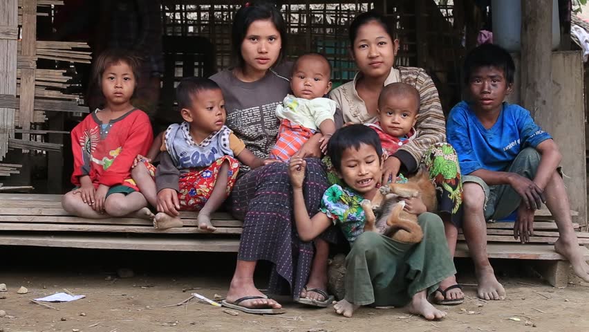 MRAUK-U, MYANMAR - JANUARY 27, 2016: Unidentified Burmese Woman And Boy ...