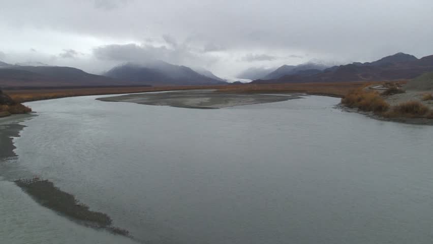 Shallow Lake Under Cloudy Mountains Stock Footage Video (100% Royalty ...