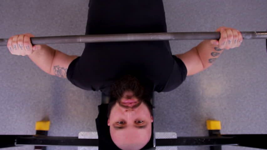Front View Of Muscular Prisoner Whom Is Lifting Weights In Prison ...