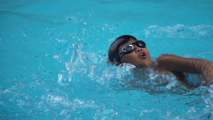 Healthy Boy Front Crawl Swims Slow Motion In Swimming Pool , Asian ...
