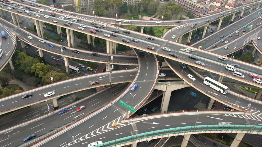 SHANGHAI, CHINA - 6 NOVEMBER 2015: Cars Drive Across An Impressive ...