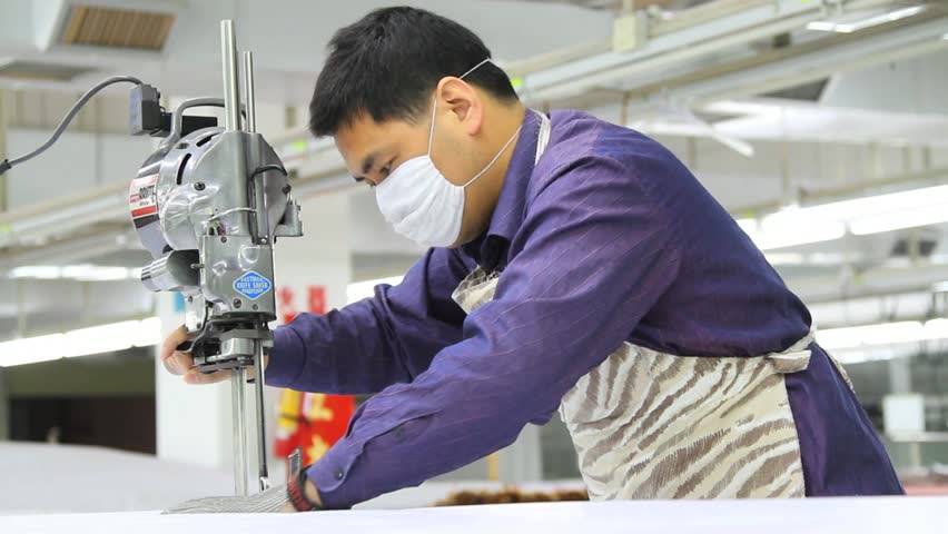 SHENZHEN, CHINA - JUNE 5: Wide Shot Of Textile Factory Workers Working ...
