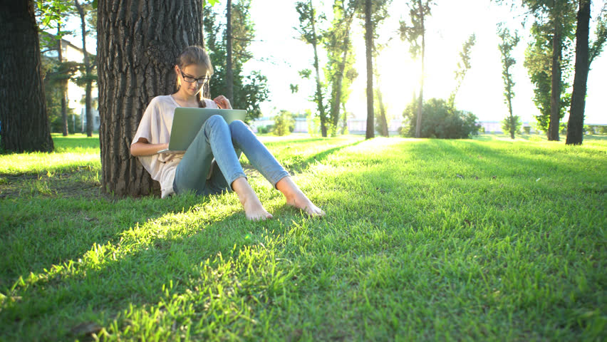 HD Little Girl Laying In Field Grass - Stock Video. A Beautiful Little ...