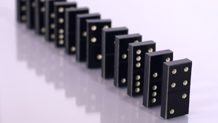 Black Dominoes Falling In Chain Reaction Stock Footage Video 9334763 ...