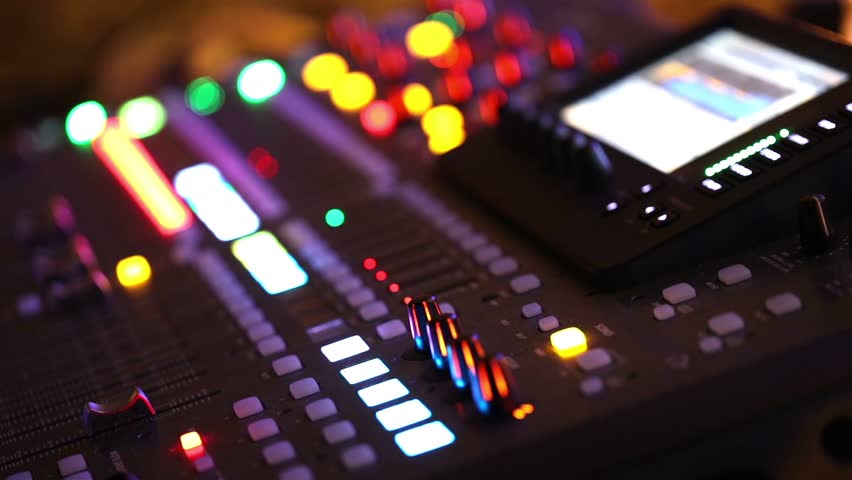 Footage Of A Colorful Audio Mixer, The Shot Is Moving From The Left To ...