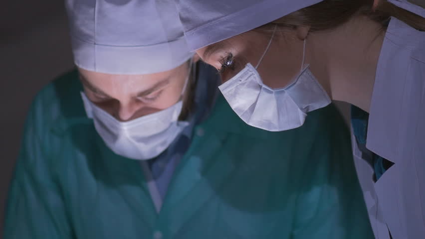 Surgeons Team Performing Operation.Surgeon Operating Patient.Surgical ...