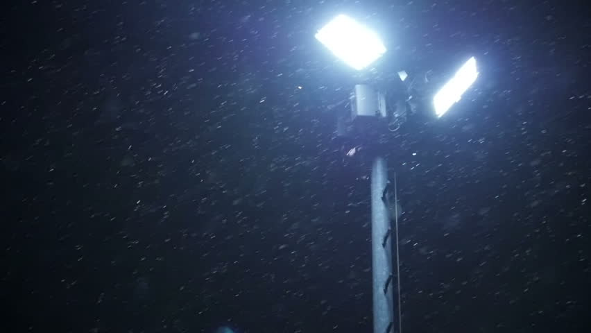 Snow Falling With Streetlight Beams At Night. Loop Able Snow Fall ...