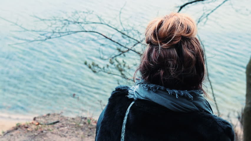 Blonde Woman Scared Before Jump Off Waterfall Filmati e video d ...