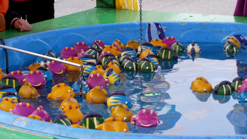 Trying To Win A Fish At Carnival Stock Footage Video 6260774 | Shutterstock