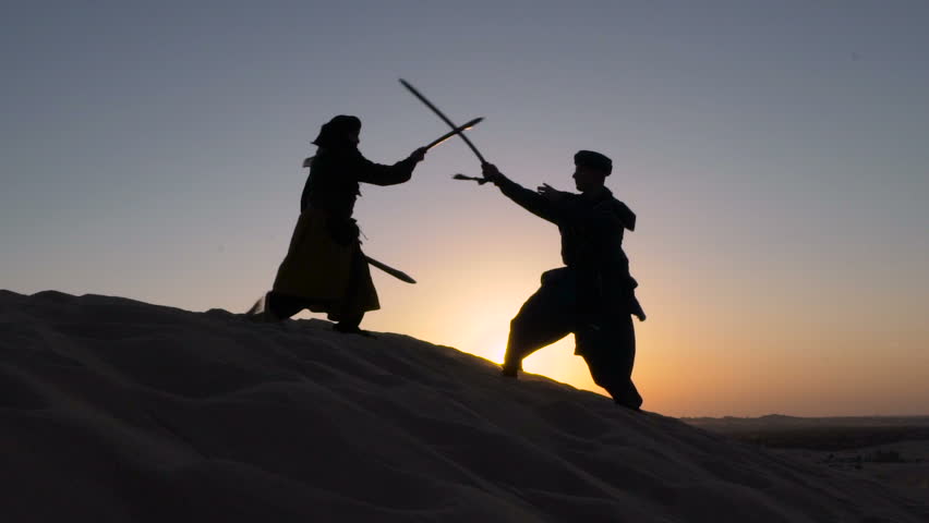 Sword Fighting at Sunset. Two Stock Footage Video (100% Royalty-free ...