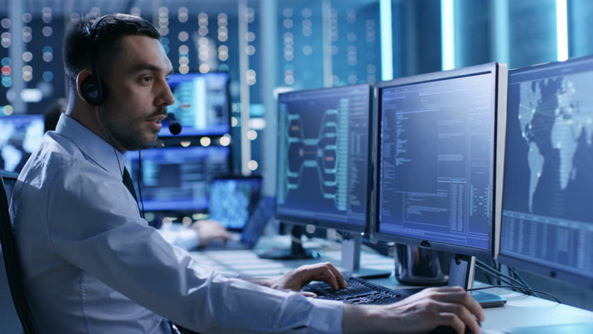In The System Control Center Team Of Technicians Monitor System ...