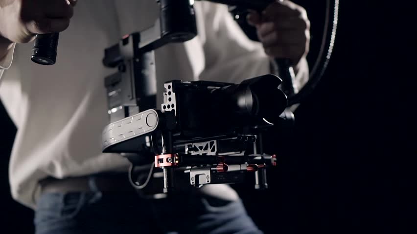 Videographer, Panning Then Zooming Camera On Viewer. Stock Footage ...