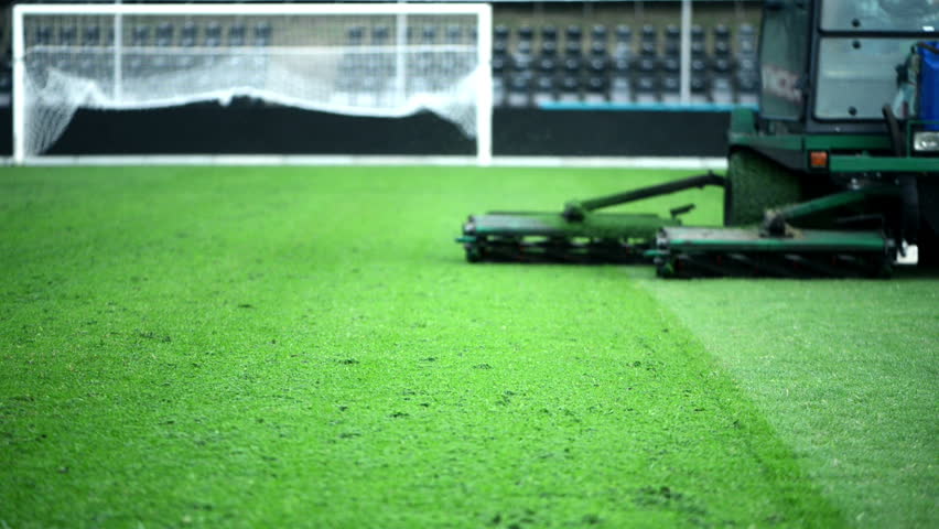 Cutting Grass in a Football Stock Footage Video (100% Royalty-free ...