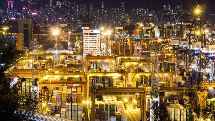 Cargo Container Loading Activity. Timelapse At Night. Wide Shot. Slowly ...