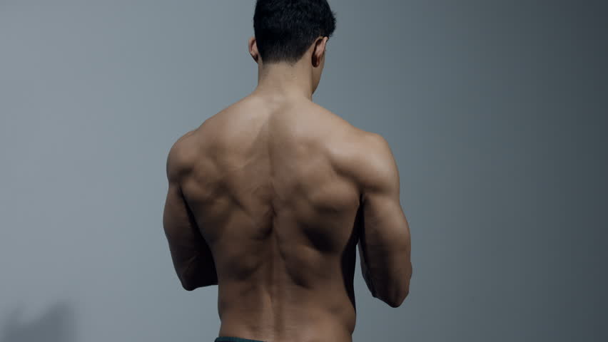 Man Bodybuilder. Muscular Guy Doing Exercises. Male Model. Athletic Man ...