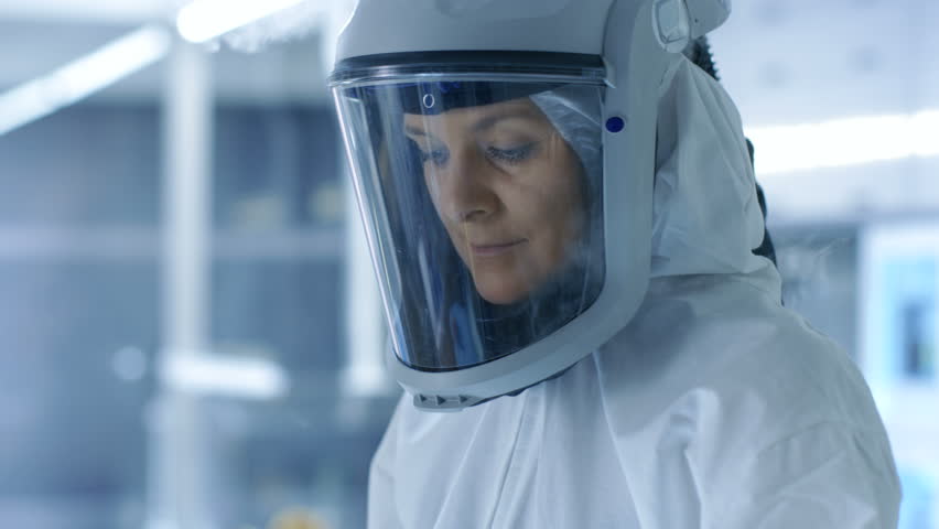 Medical Virology Research Scientist Works In A Hazmat Suit With Mask ...