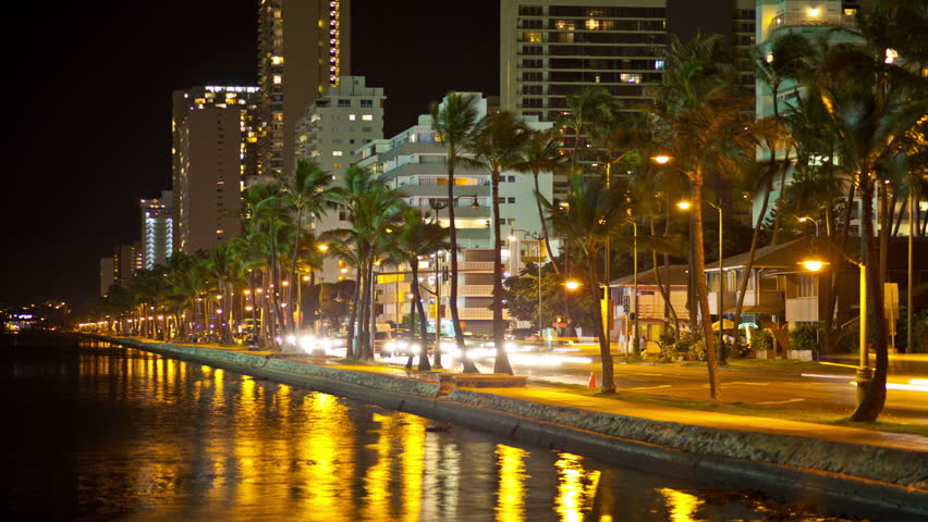 Skyline Of Honolulu And Waikiki Beach. Night Pan Right. Skyscraper ...