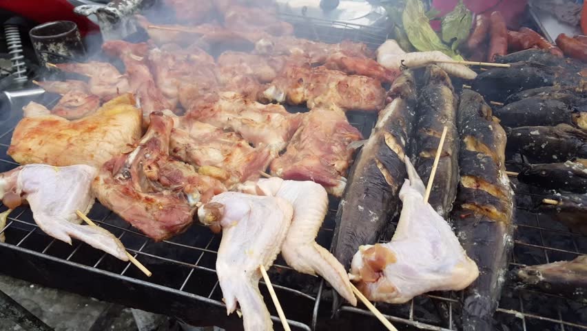 Cooking Fish And Chicken On A Barbecue Outdoors Stock Footage Video ...