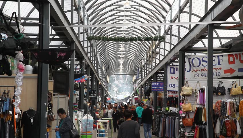 RAMLE, ISRAEL - NOVEMBER 27: Shoppers Buy Produce And Clothing At ...