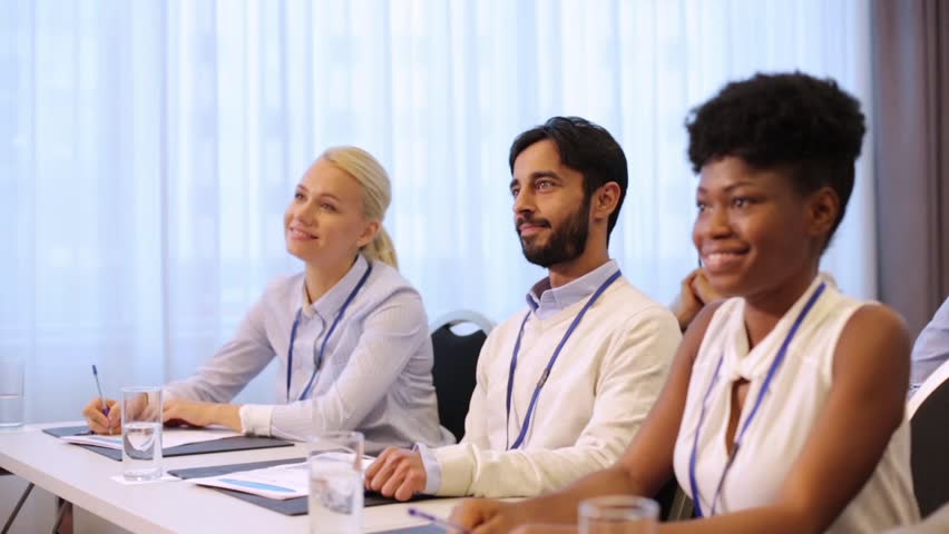 Group Of Business People Using Laptop And Tablet Computer During A ...