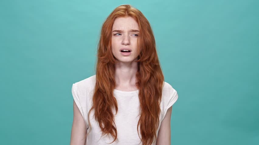 Angry Ginger Woman In T-shirt Disagree With Something And Looking At ...